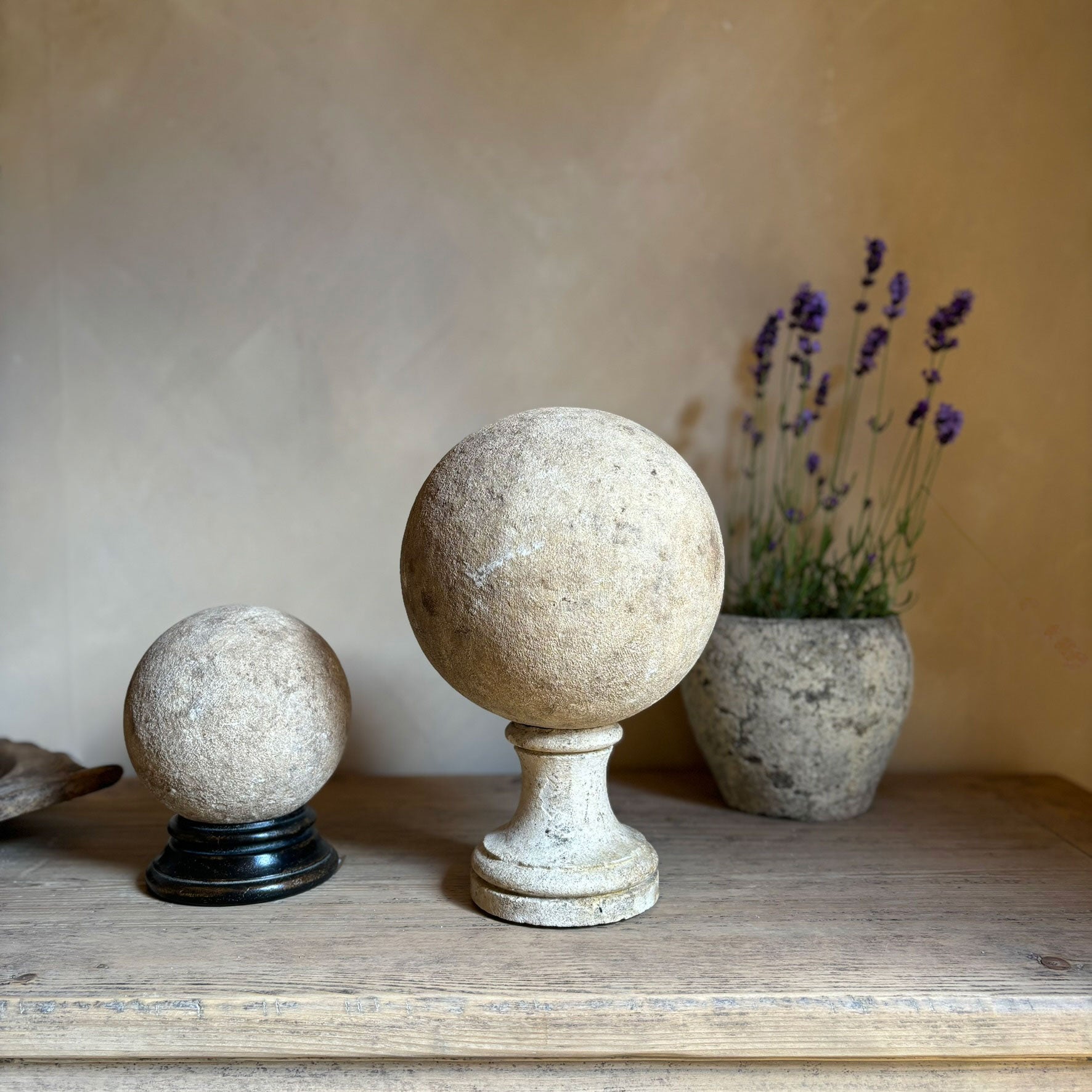 Stone stand for aged stone sphere – Home Barn
